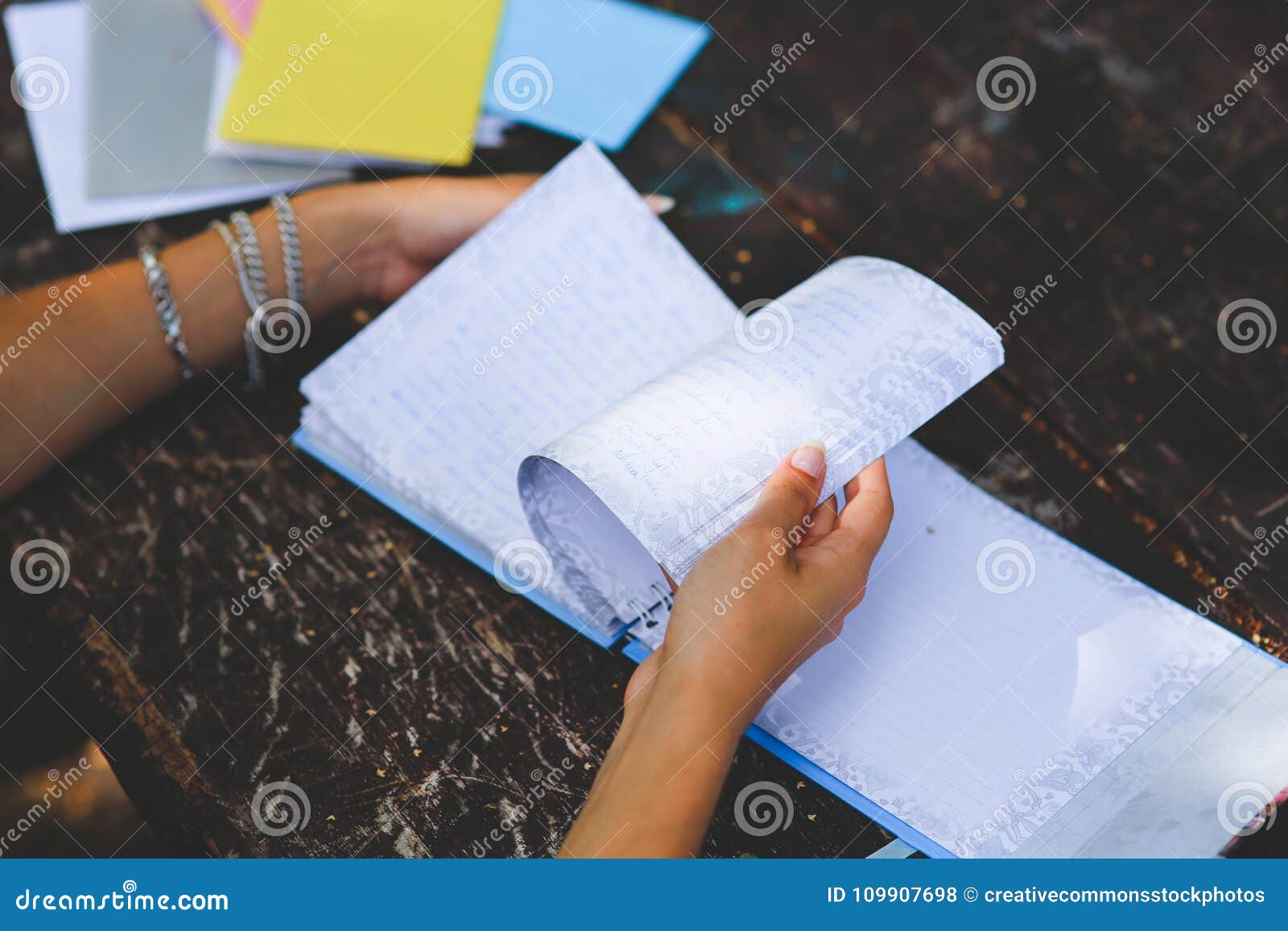 Notebook In Hands Picture. Image: 109907698