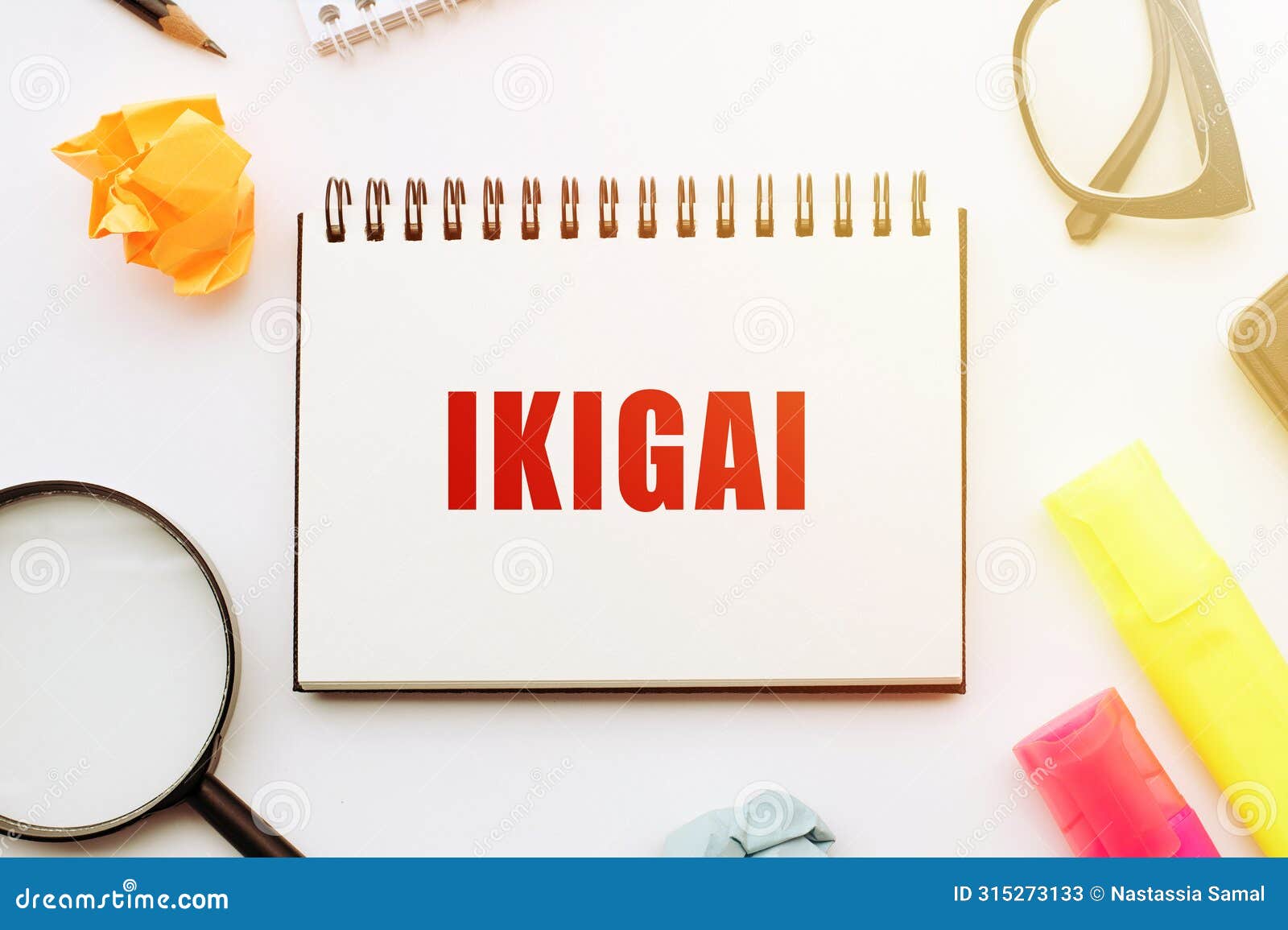 Notebook with Ikigai Next To a Magnifying Glass Stock Image - Image of ...