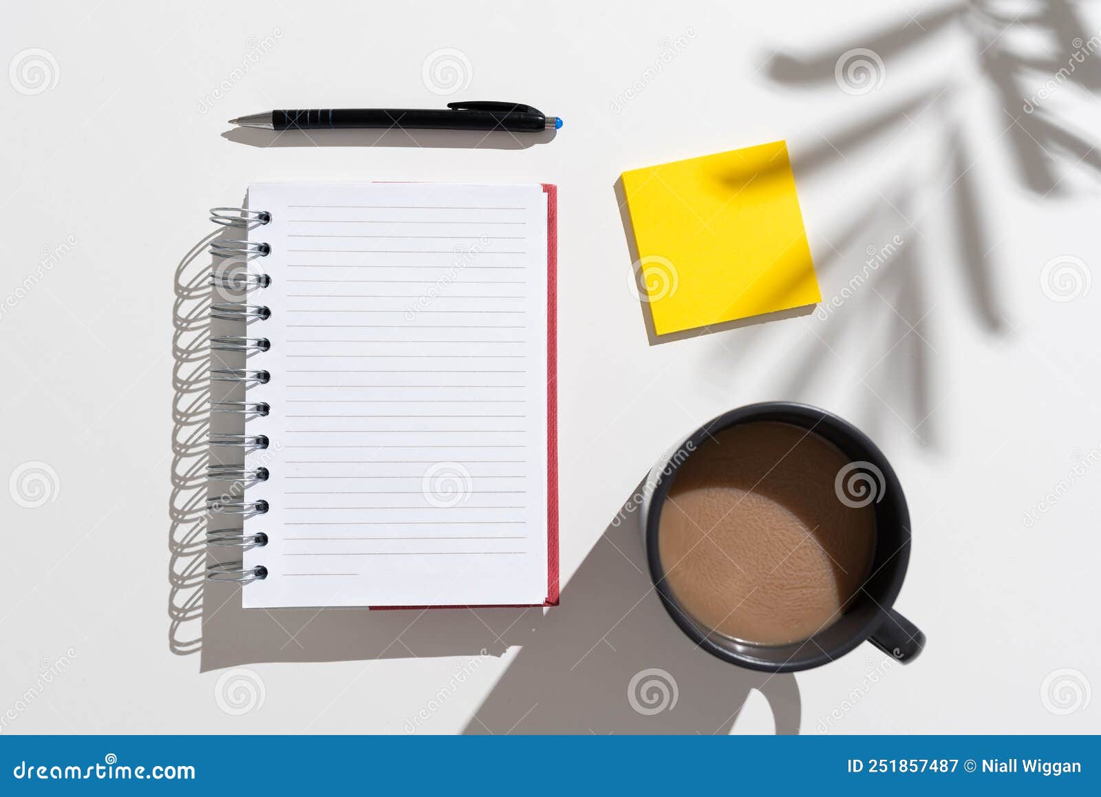 Notebook with Important Messages on Desk with Coffee, Notes and Pen ...