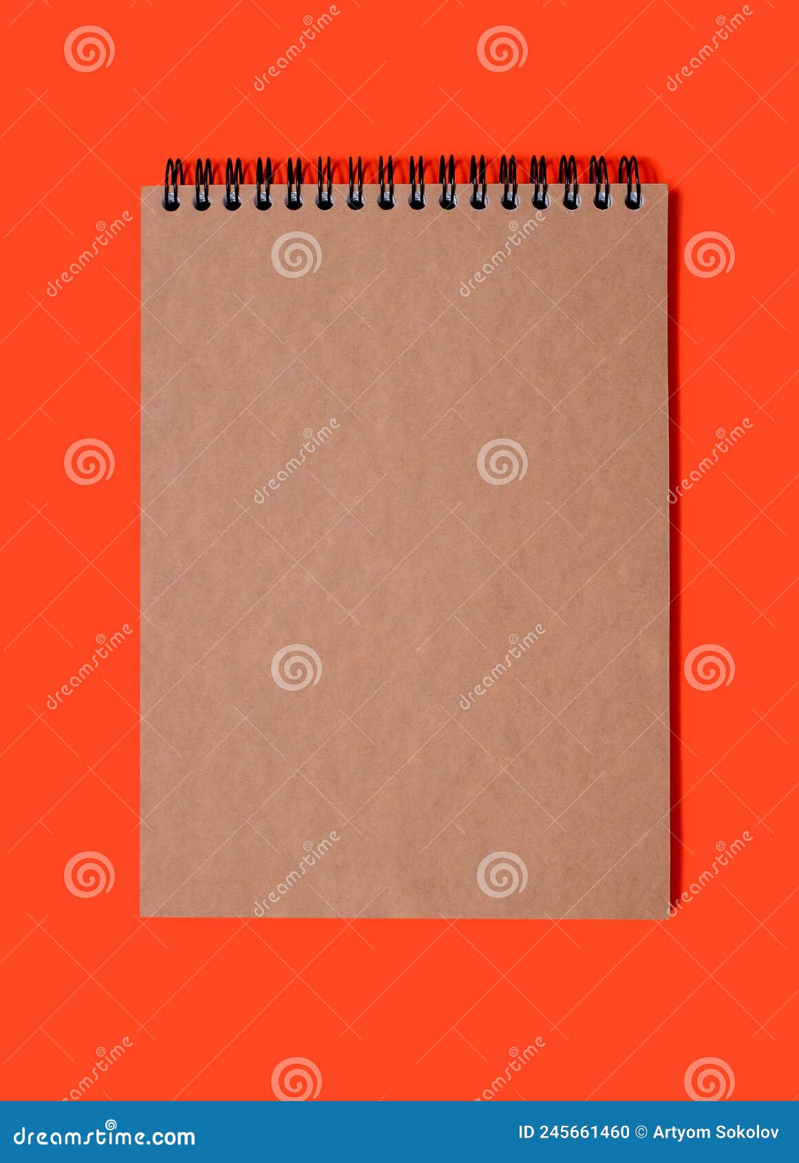 Notebook Made of Brown Paper with Binding on an Orange Background Stock ...