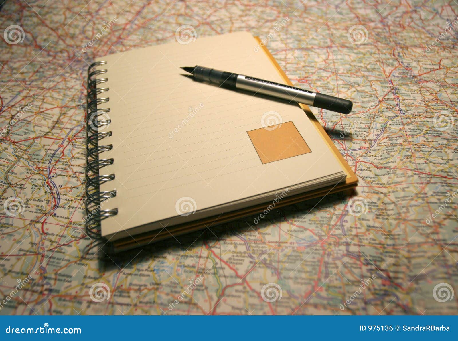 Notebook on a map stock photo. Image of road, gear, lifestyle - 975136