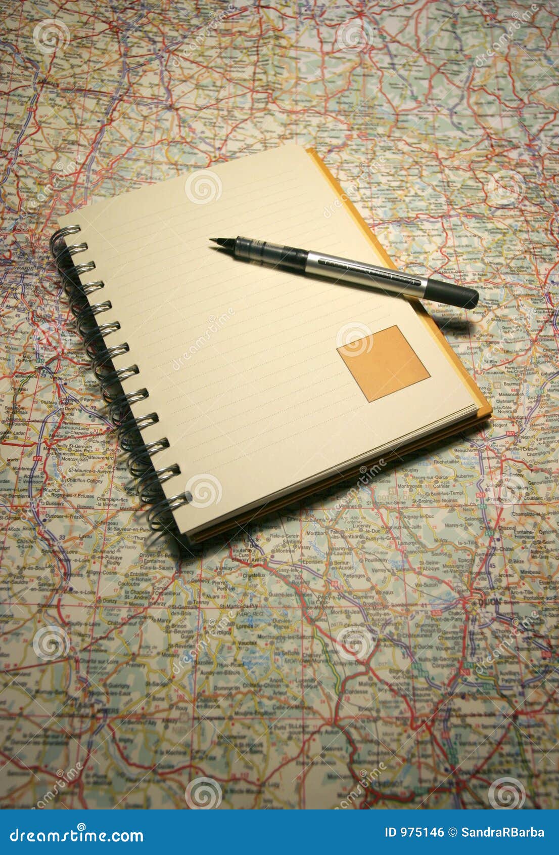 Notebook on a map stock photo. Image of holydays, trip - 975146