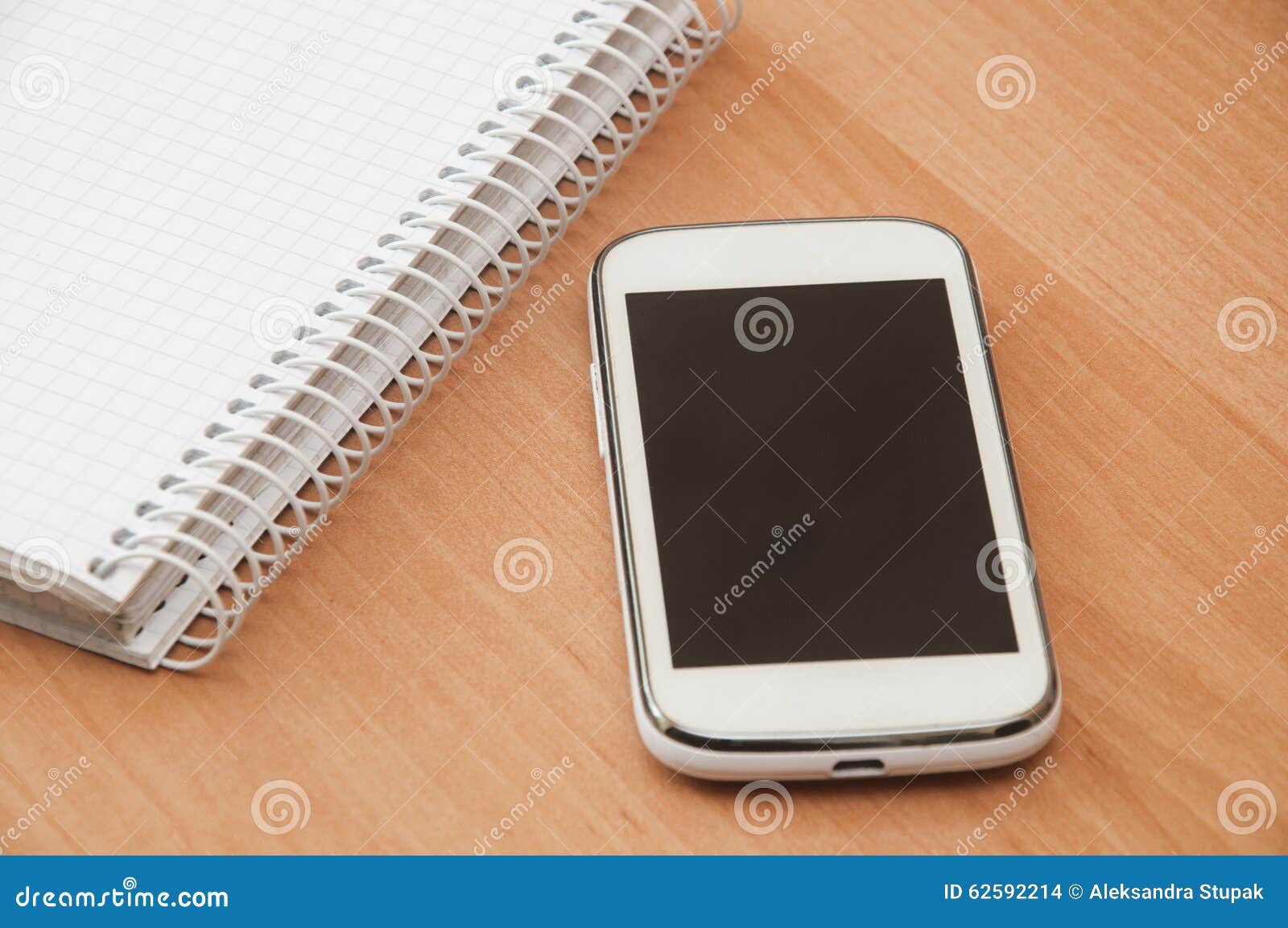 Notebook and Mobile Phone on the Table Stock Photo - Image of table ...