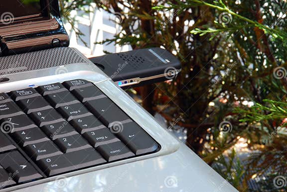 Notebook with Modem Usb 3G Key Stock Photo - Image of modern, internet ...