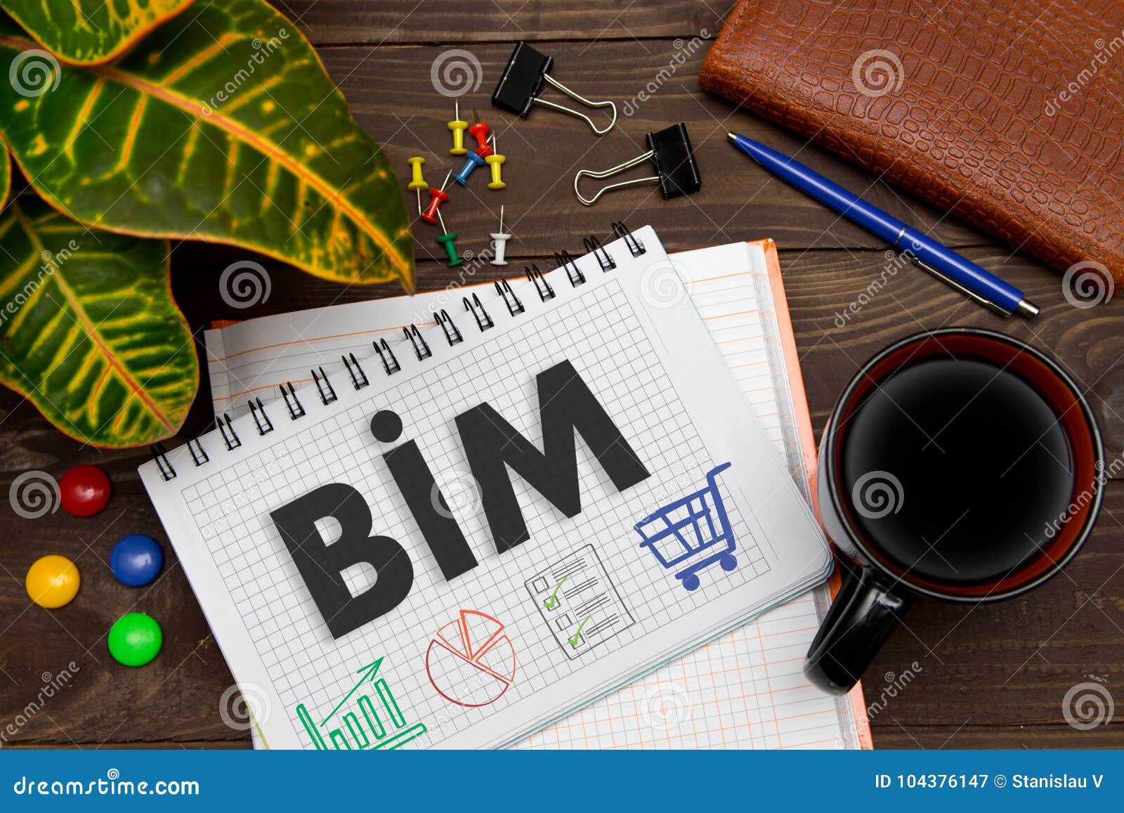 Notebook With A Notes BIM On The Office Table With Tools. Concept With ...