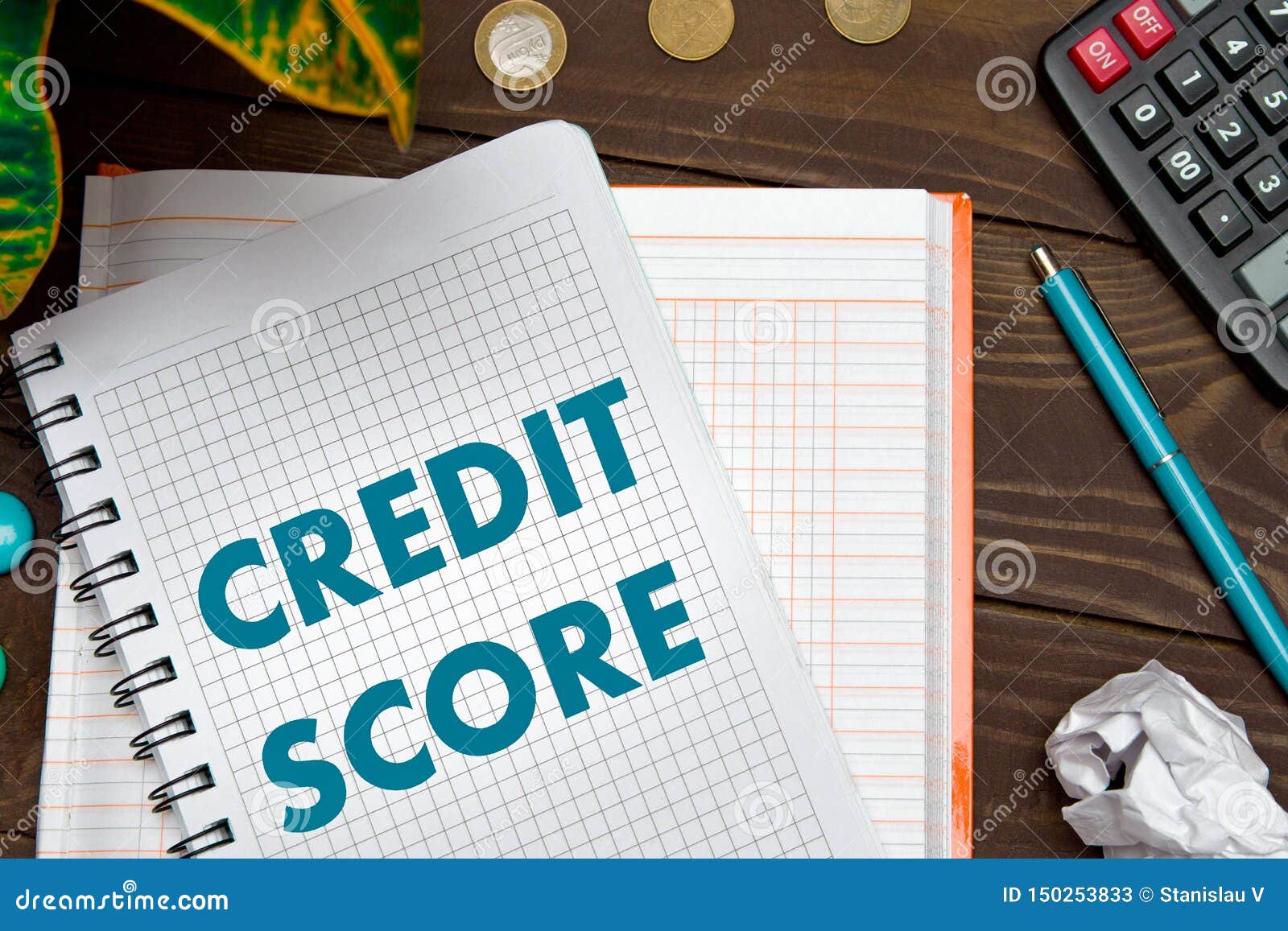 Notebook with a Notes CREDIT SCORE on the Office Table with Tools ...