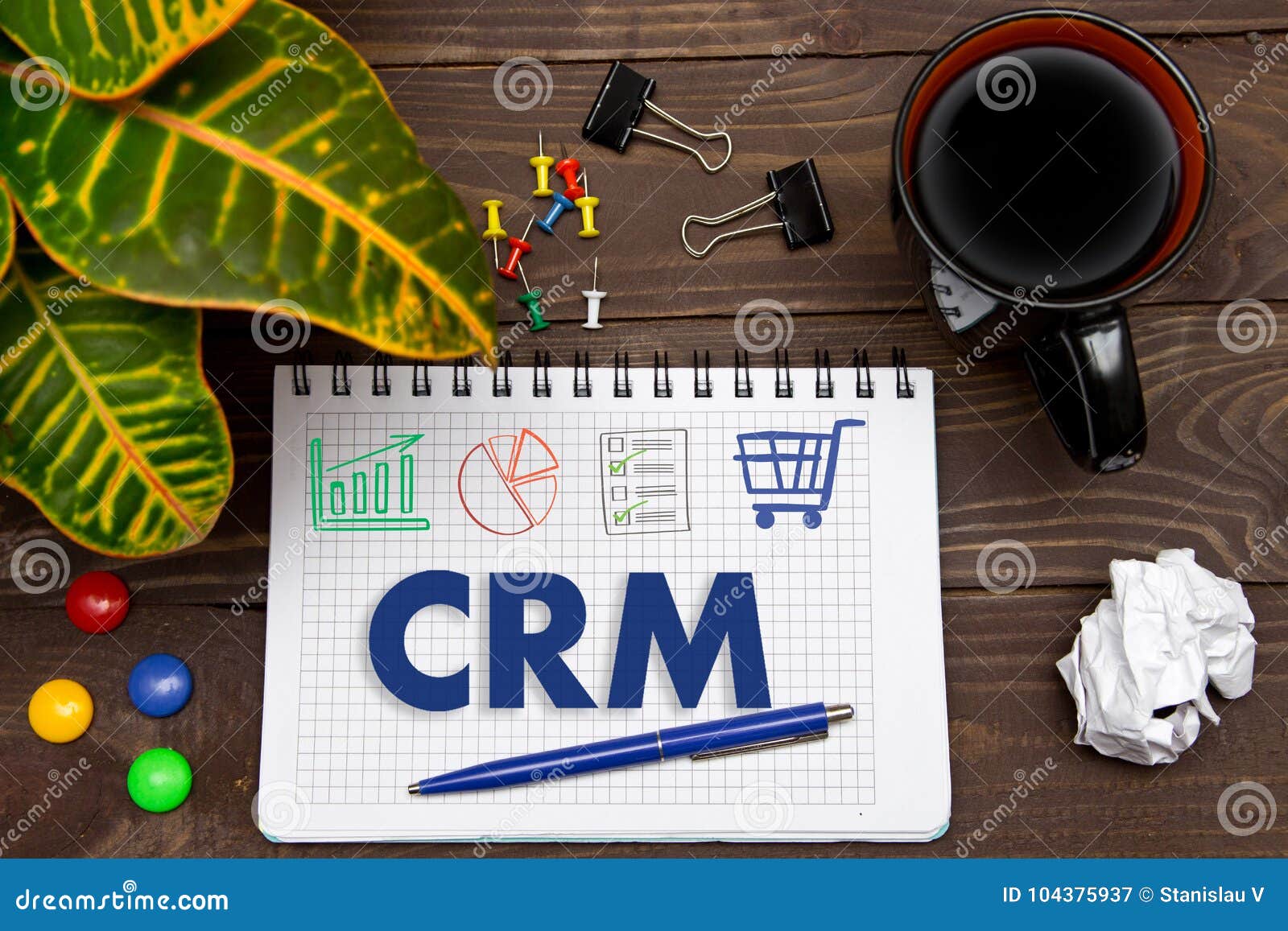 Notebook with a Notes CRM on the Office Table with Tools. Concept with ...