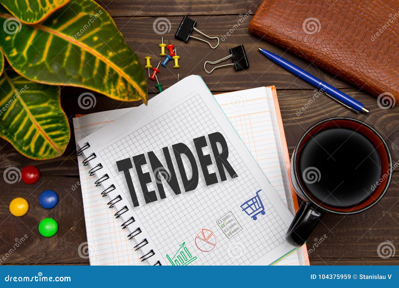 Notebook with a Notes TENDER on the Office Table with Tools. Con Stock ...