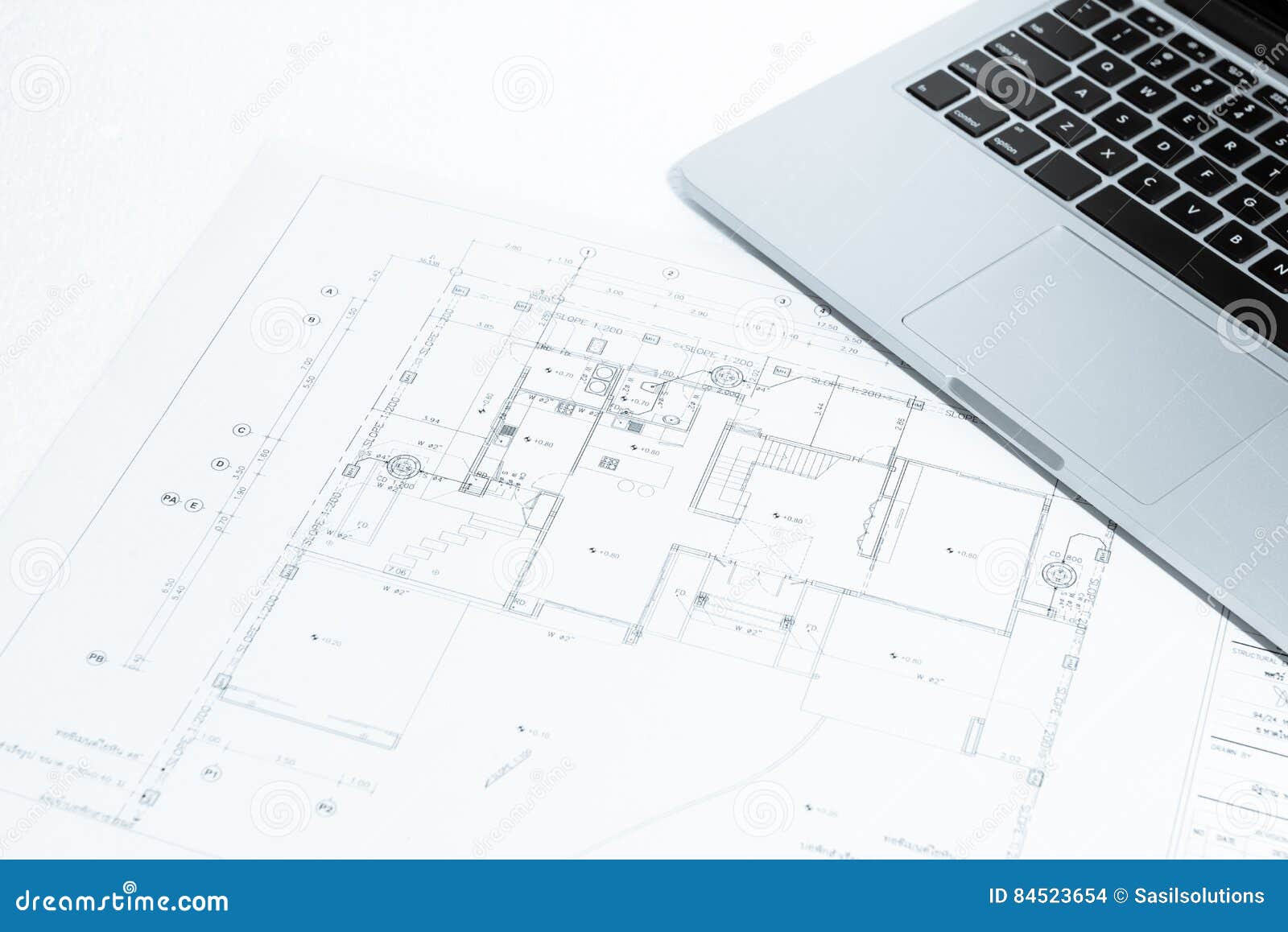 Notebook Over House Construction Blueprint with Blue Tone Effect Stock ...