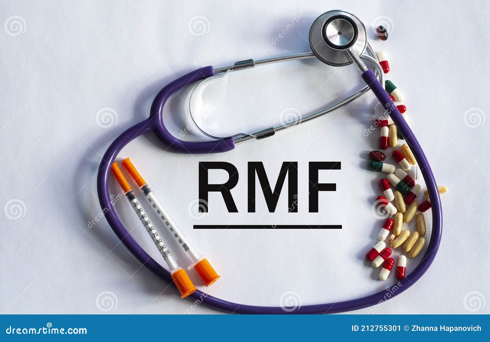 Notebook Pade with Acronym RMF on a Table with a Stethoscope and Pills ...