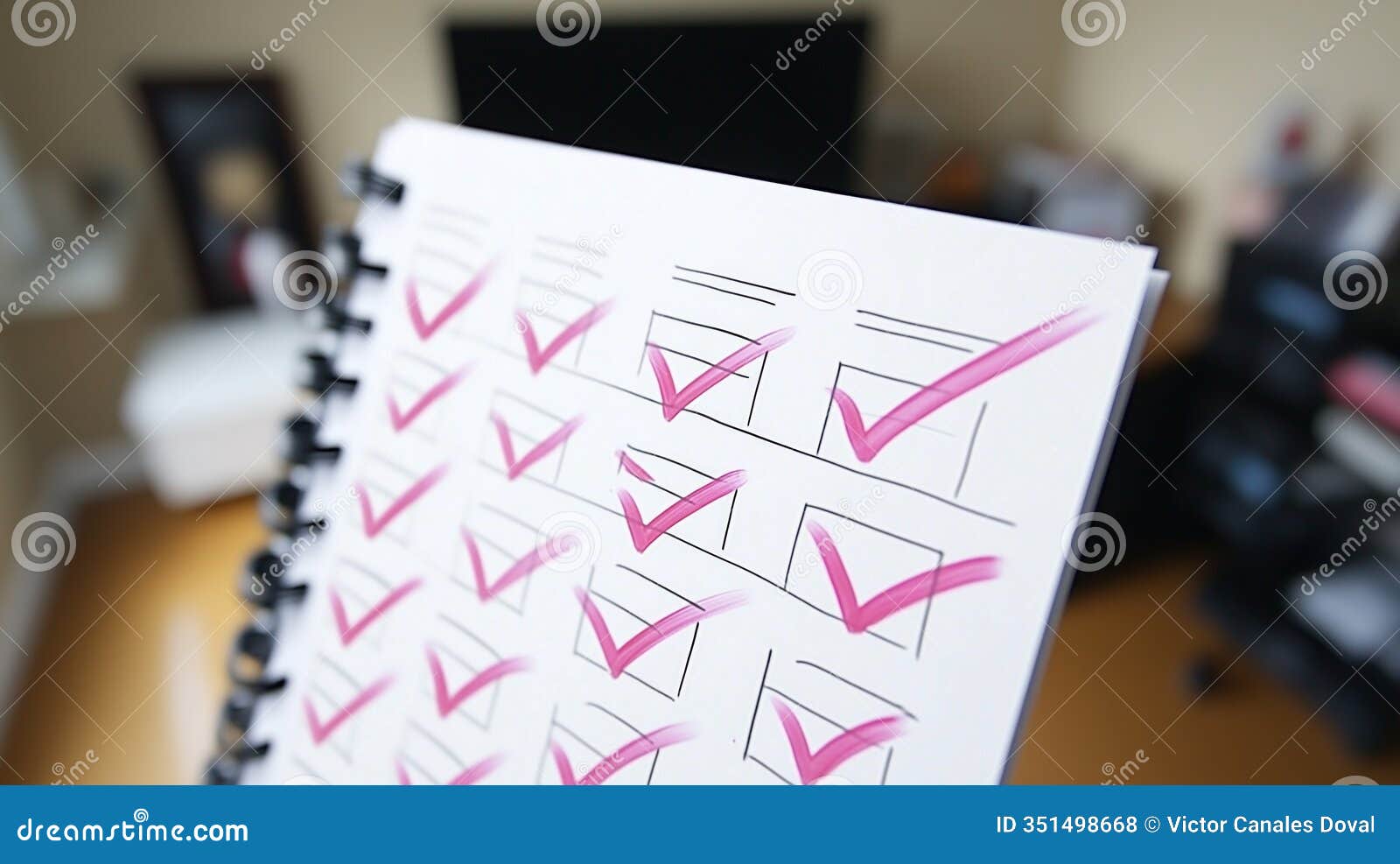 Completing Checklist Items with Pink Check Marks in Notebook Stock ...