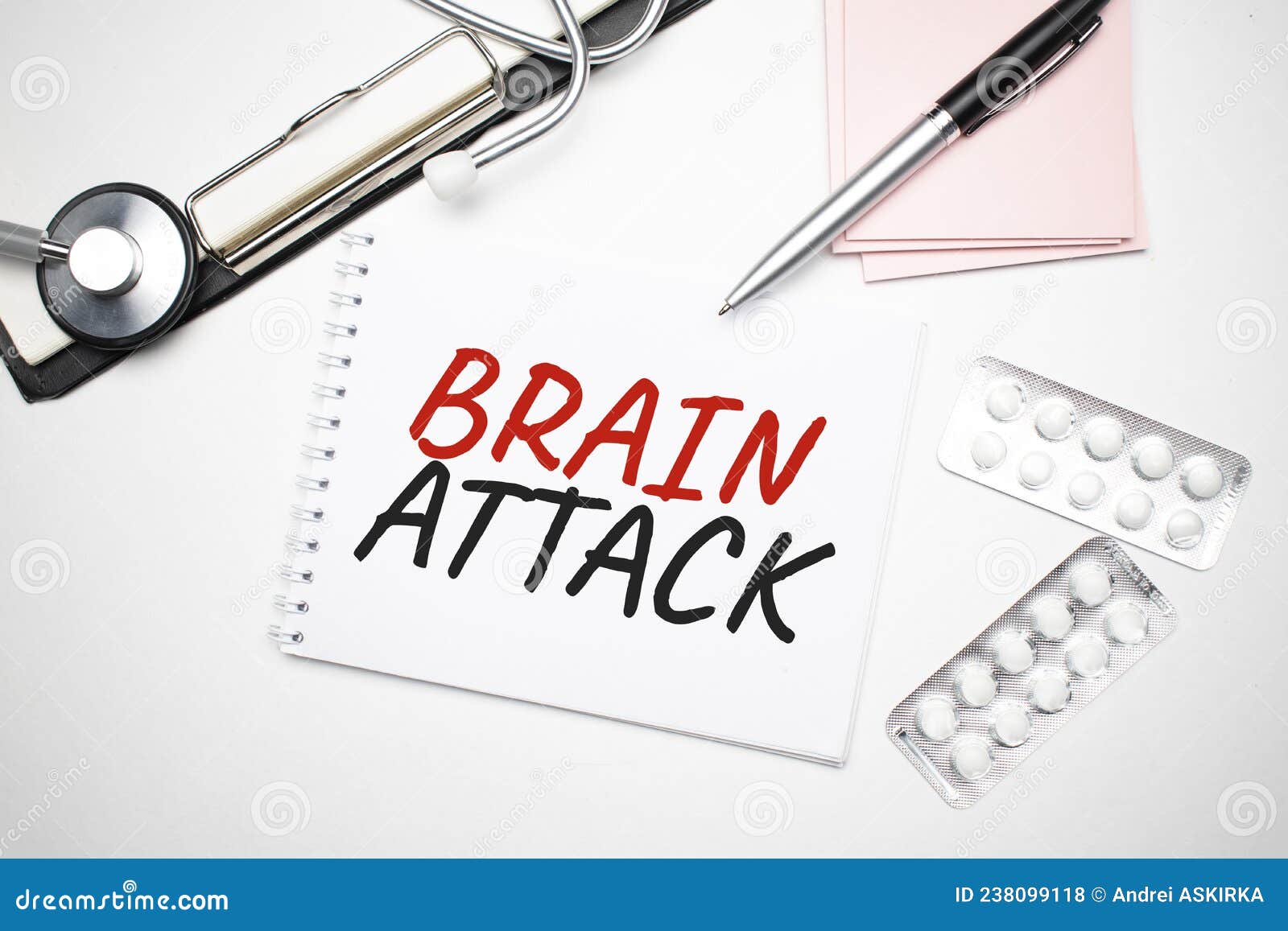 Notebook Page with Text Heart Attack, on a Table with a Stethoscope and ...