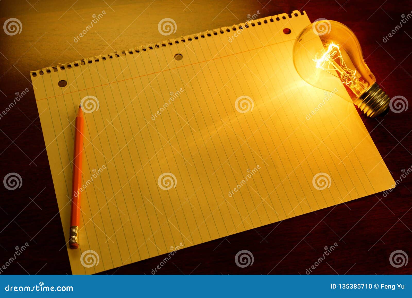 Notebook Paper and Light Bulb Stock Photo - Image of imagination ...