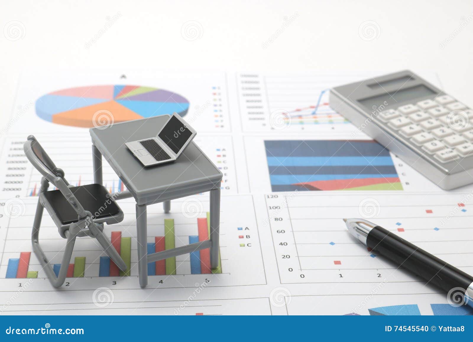 Notebook PC and Business Documents with Numbers and Charts. Stock Photo ...