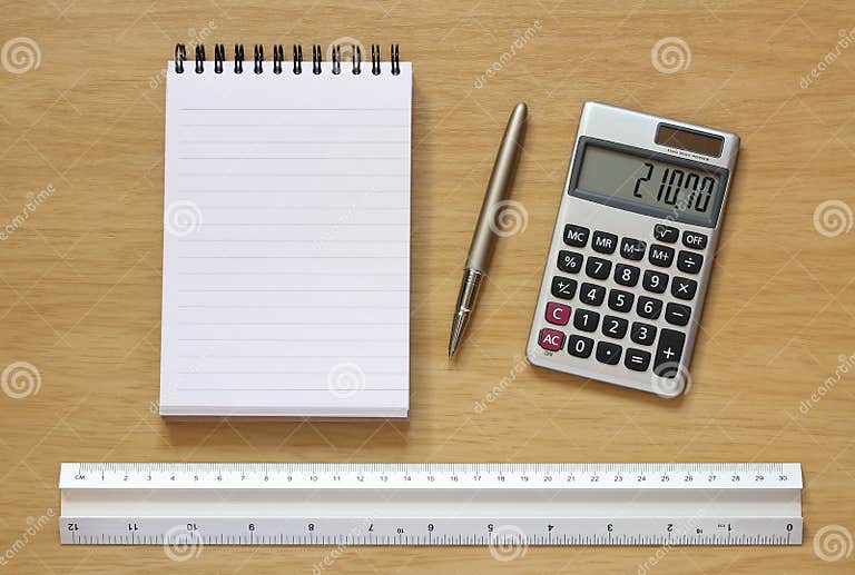 Notebook Pen Calculator and Ruler on Desk Stock Image - Image of ...