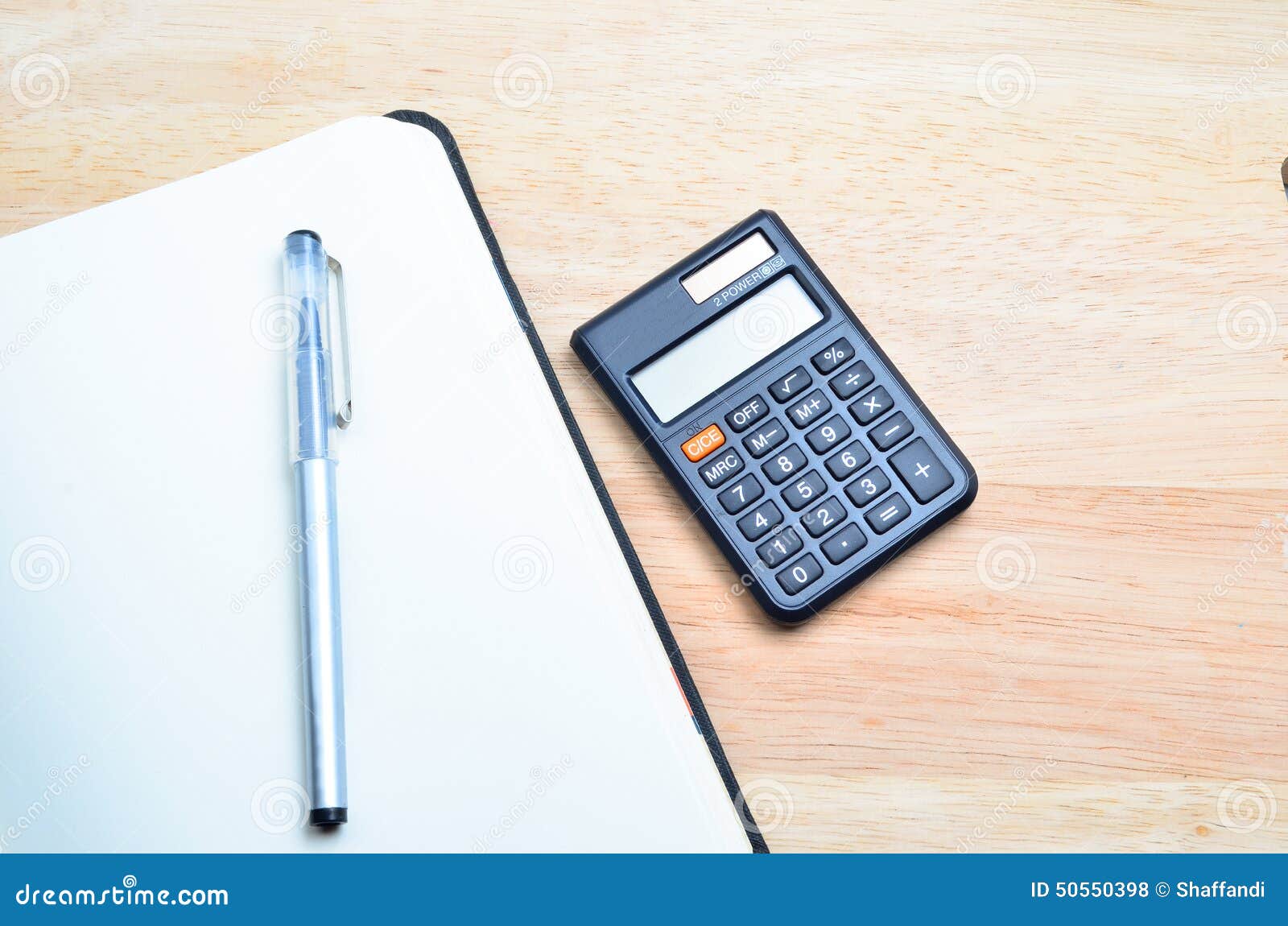 Notebook and Pen with Calculator on Wooden Table Stock Photo - Image of ...