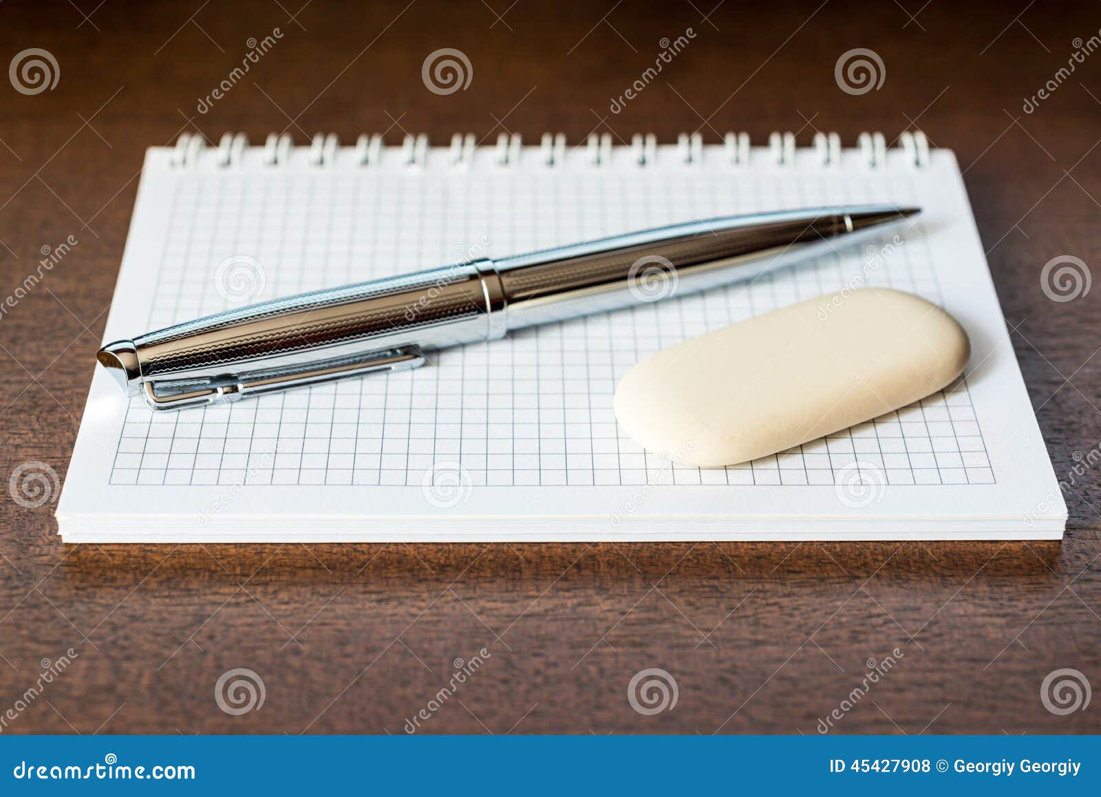 Notebook with a Pen and Eraser on the Table Stock Photo - Image of ...