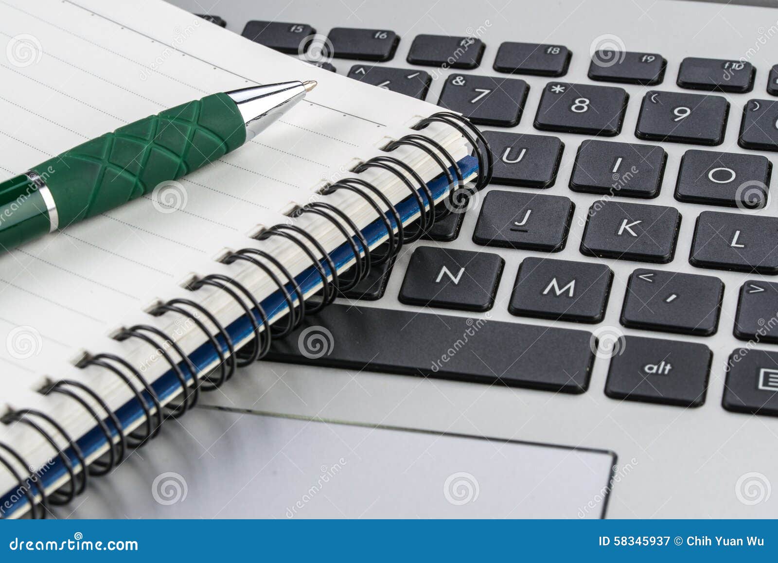Notebook and Pen on the Laptop Keyboard, Close Up Stock Image - Image ...