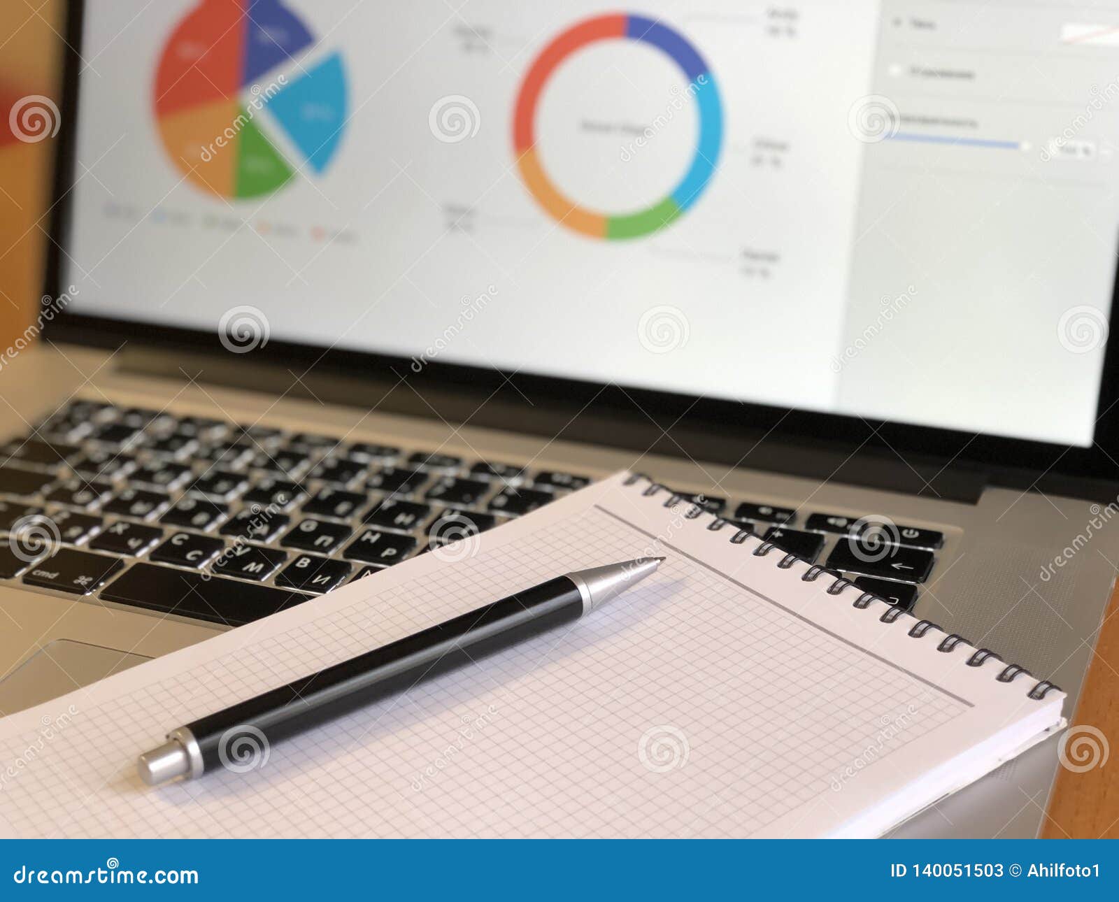 Notebook with Pen on Laptop Keyboard. Stock Image - Image of notebook ...