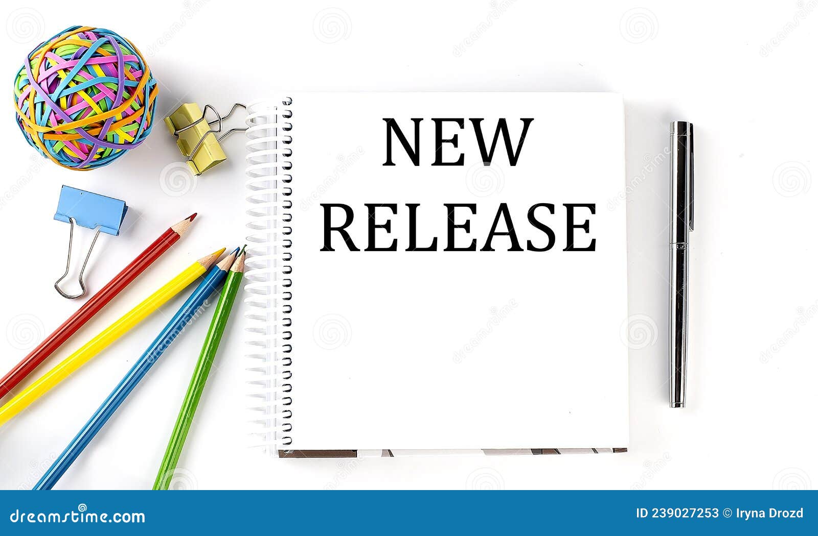 Notebook ,pencils,pen and Rubber Band with Text NEW RELEASE on the ...