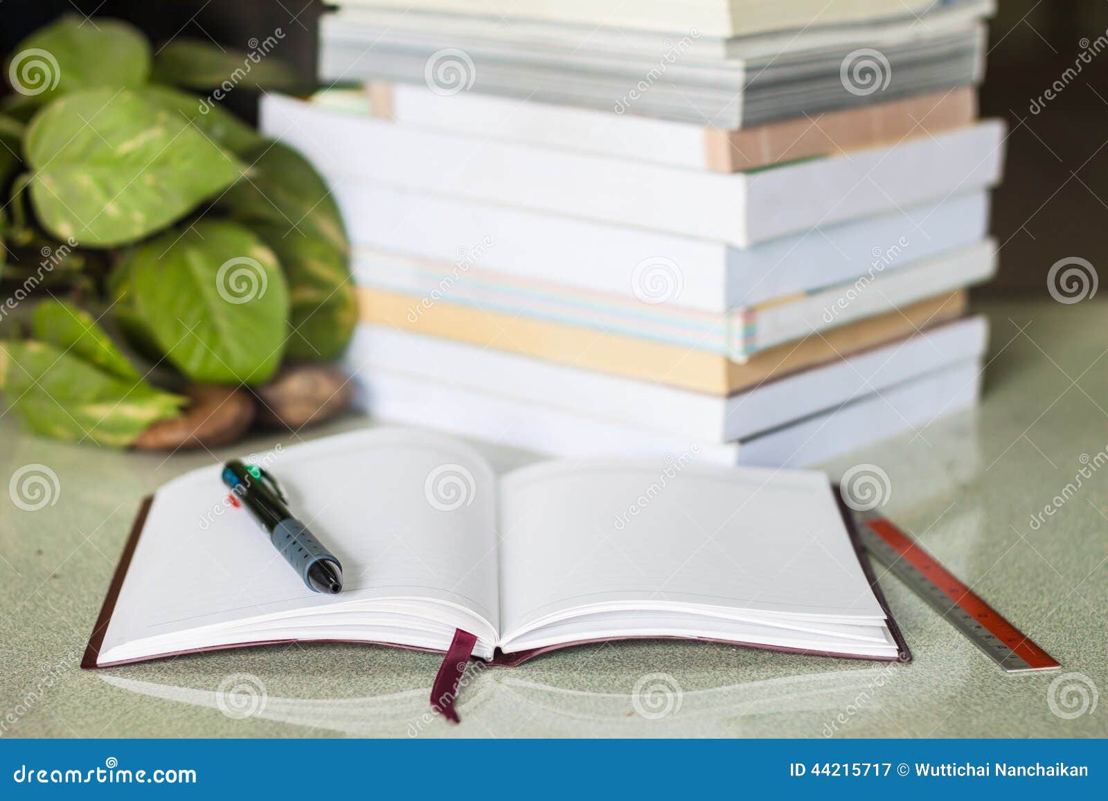 Notebook and pile of books stock image. Image of clean - 44215717