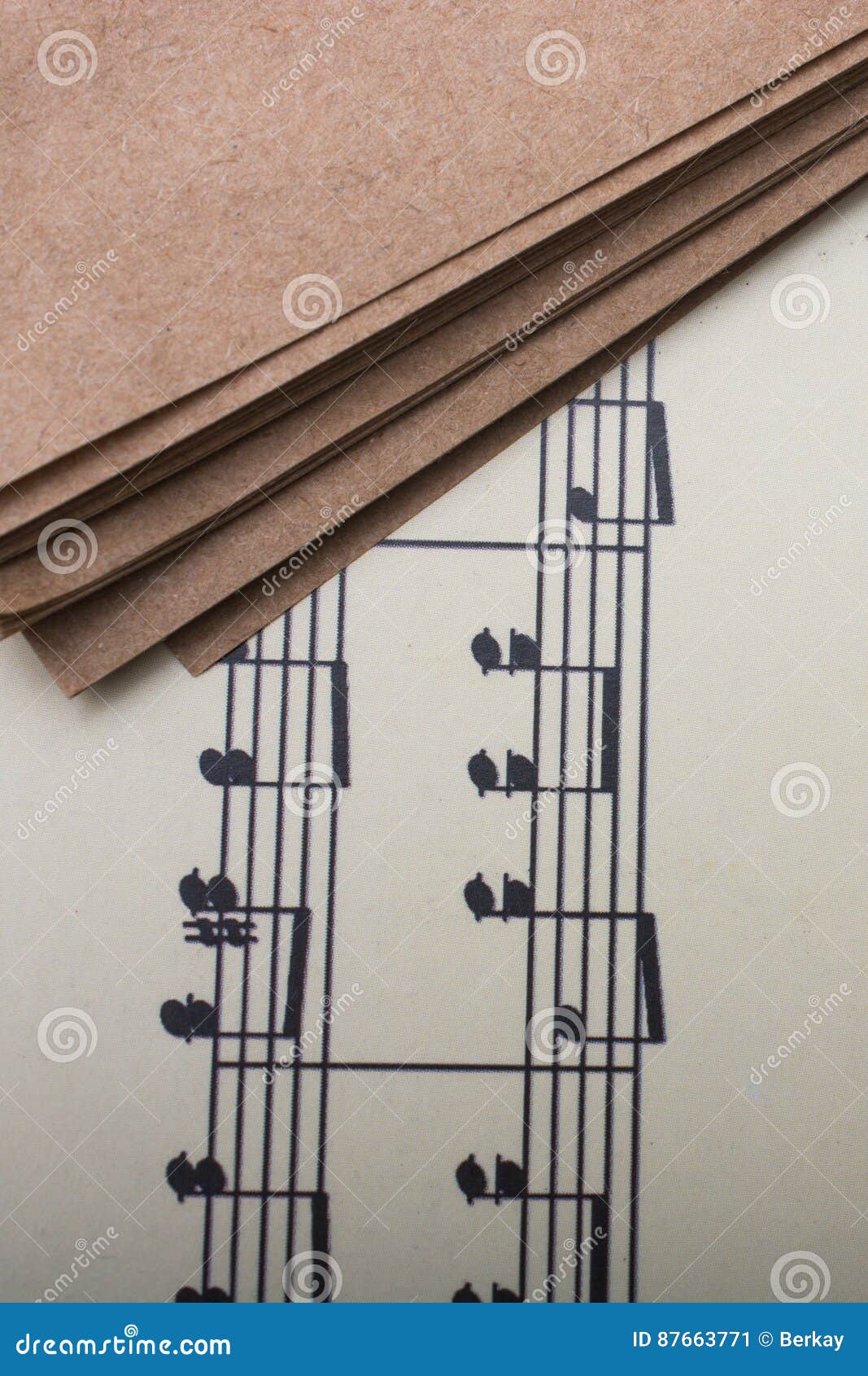 Notebook Placed on Paper with Musical Notes Stock Image - Image of note ...