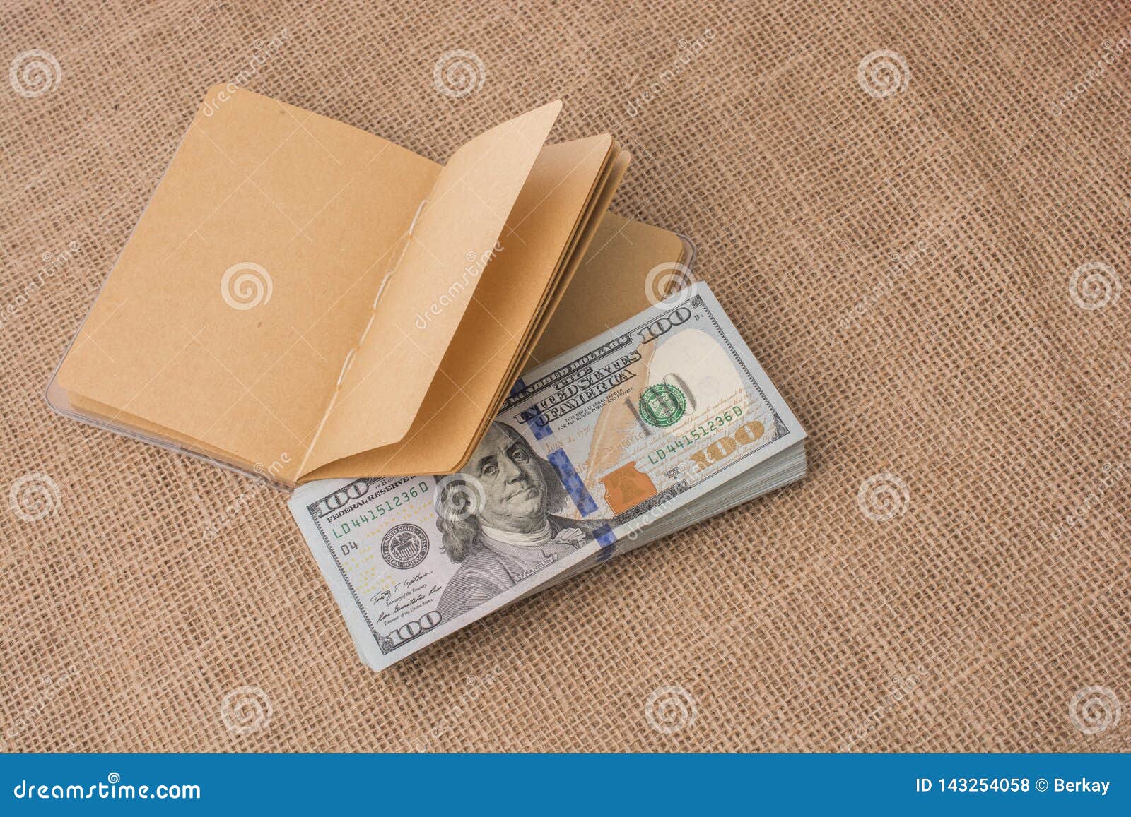 Notebook Placed beside US Dollar Banknotes Stock Photo - Image of money ...