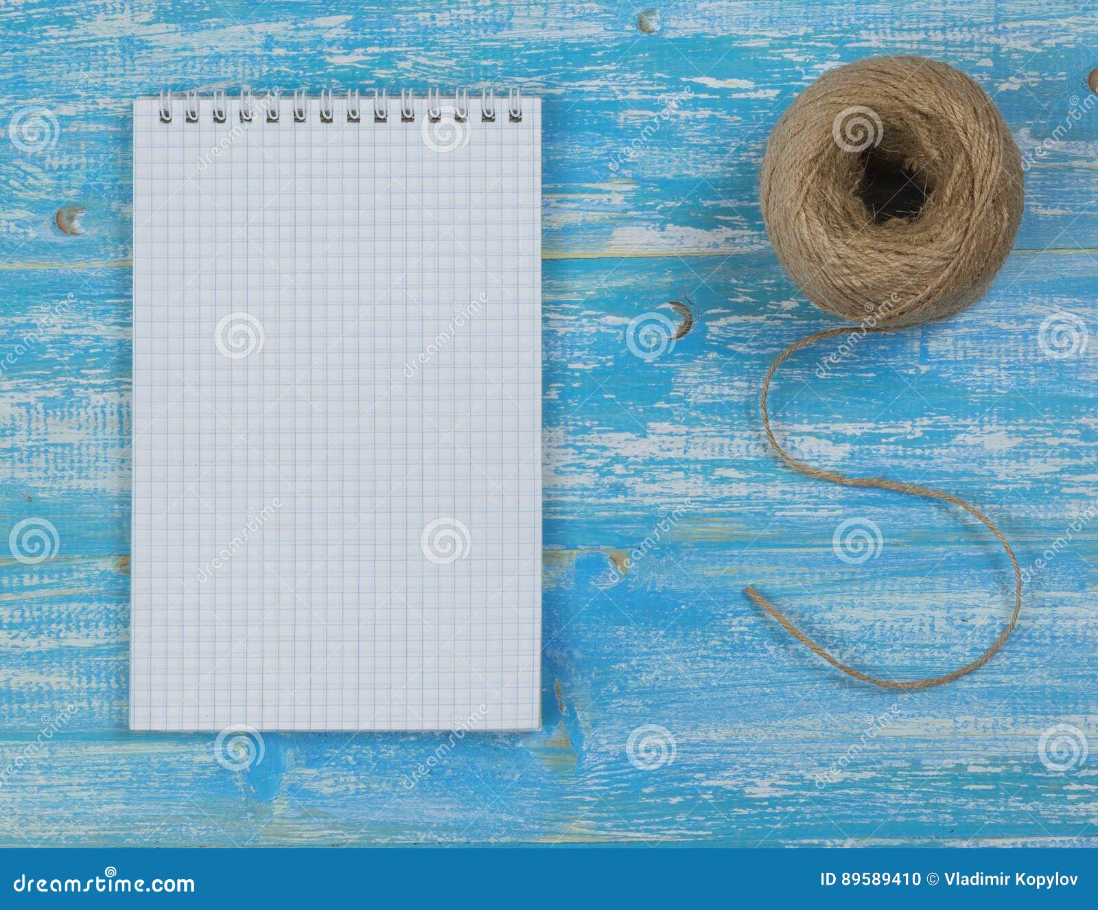 A Notebook and a Rough Rope on a Blue Wooden Table. Stock Photo - Image ...