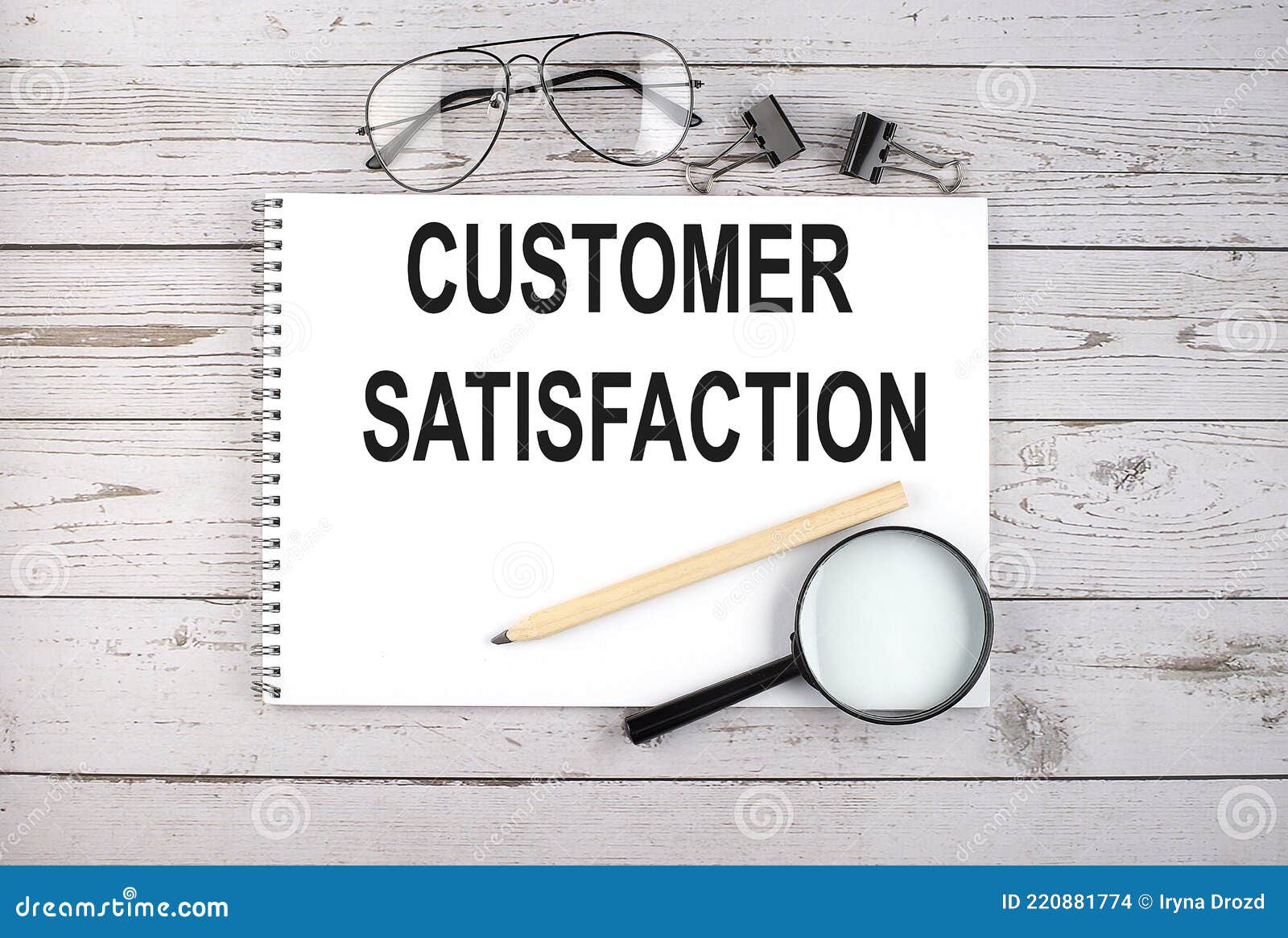 Notebook with Text CUSTOMER SATISFACTION on the Wooden Table with Pen ...