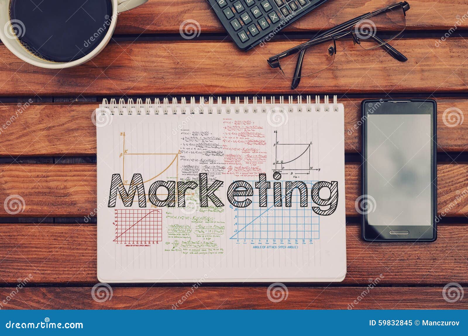Notebook with Text Inside Marketing on Table with Coffee, Mobile Stock ...