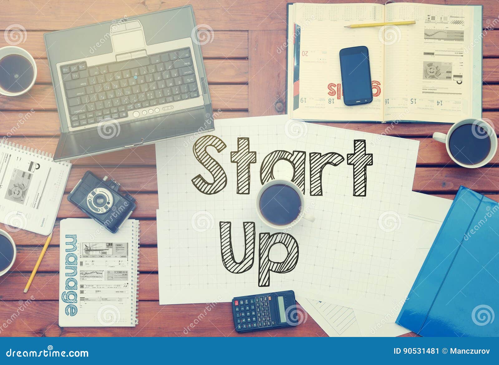Notebook with Text Inside Start Up on Table with Coffee, Mobile Stock ...