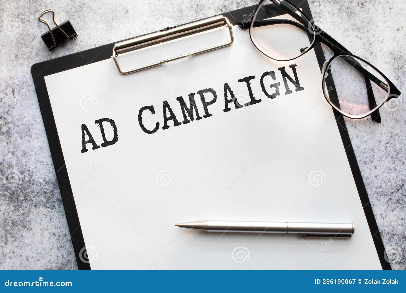 Notebook with Tools and Notes about Ad Campaign Stock Image - Image of ...