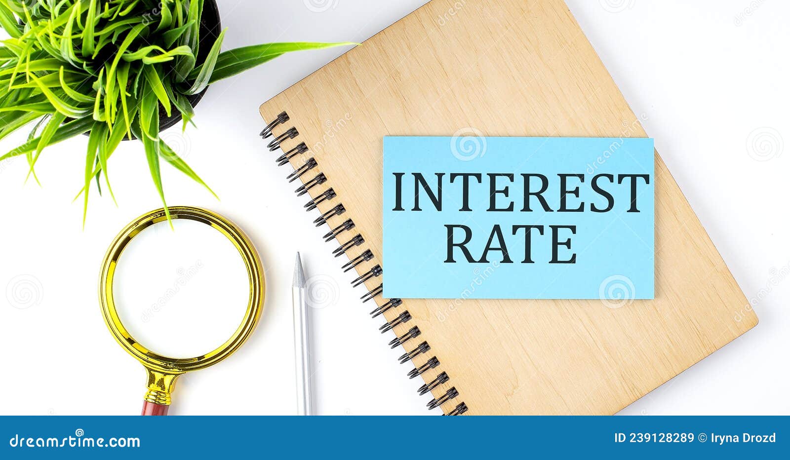 Notebook with Tools and Notes with Text on the Blue Sticker INTEREST ...