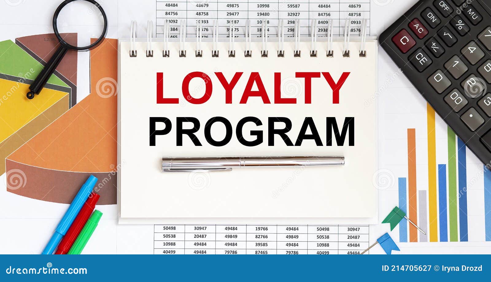 Notebook with Tools and Notes with Text Loyalty Program on the Charts ...