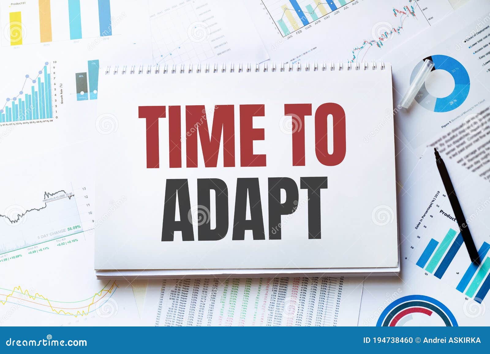 Notebook with Tools and Notes with Text TIME TO ADAPT Stock Photo ...