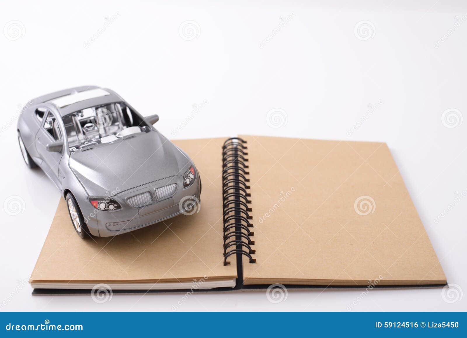 Notebook with a toy car stock photo. Image of accessories - 59124516