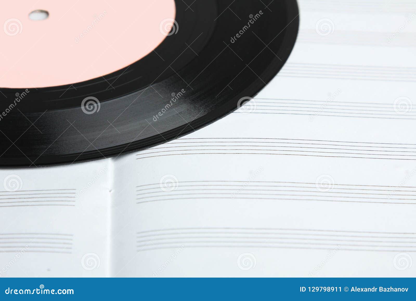 Notebook and vinyl record stock image. Image of soundtrack - 129798911