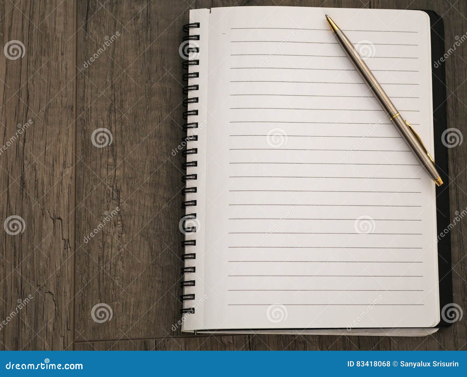 Notebook on a Wood Table with Pen.Top View Stock Photo - Image of sheet ...
