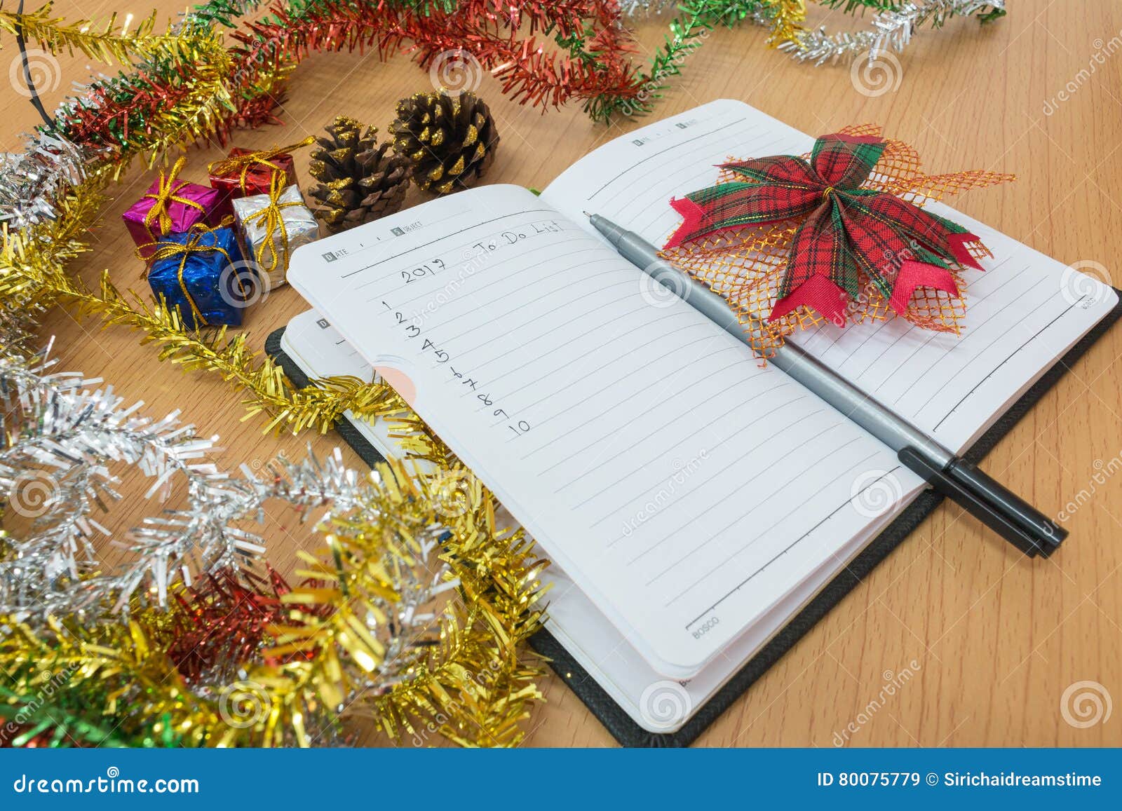 Notebook on a wooden table stock image. Image of occupation - 80075779
