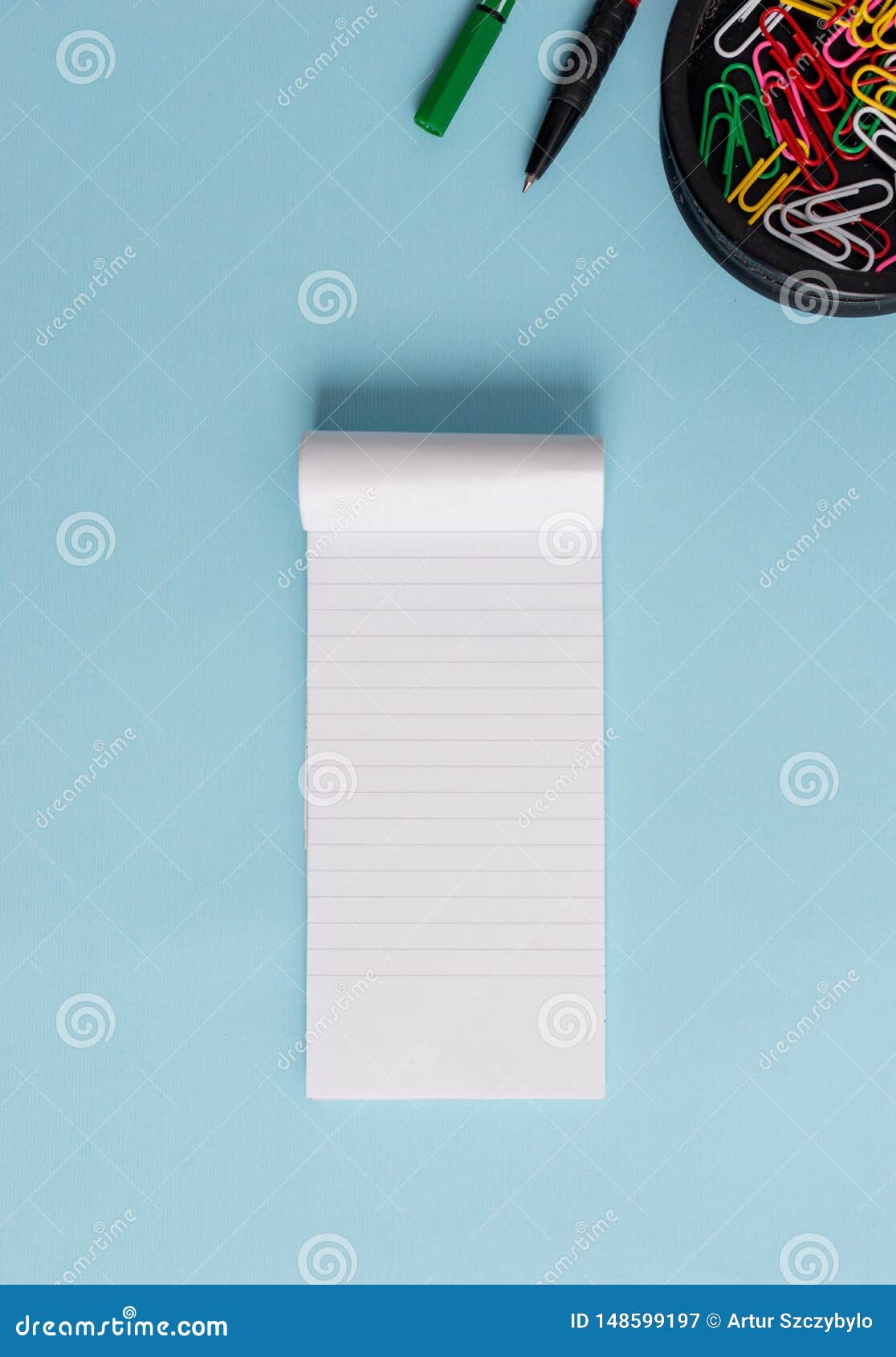 Notebook and Writing Equipment with Computer Tool Above Pastel Backdrop ...