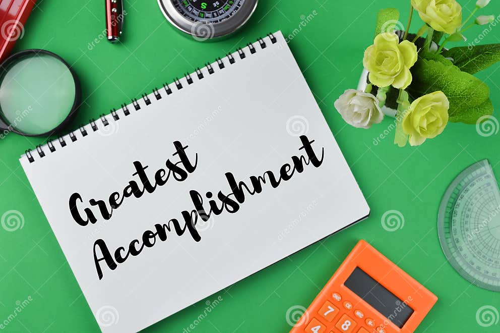 Notebook Written with GREATEST ACCOMPLISHMENT Stock Image - Image of ...