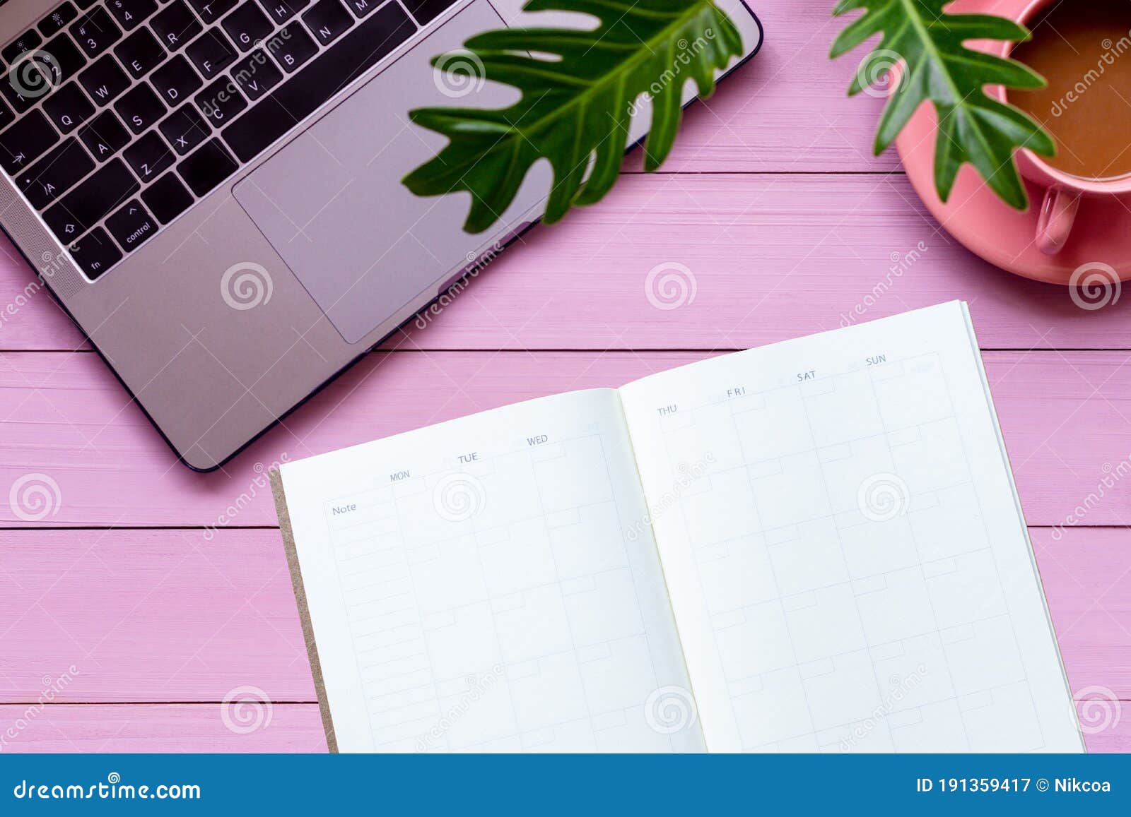 Laptop Computer with Weekly Planner Diary Notebook Stock Image - Image ...