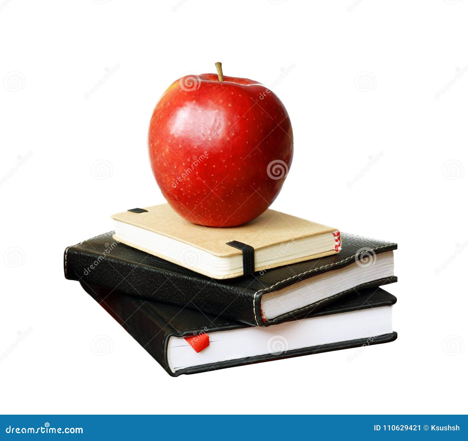 Notebooks and an apple stock image. Image of office - 110629421
