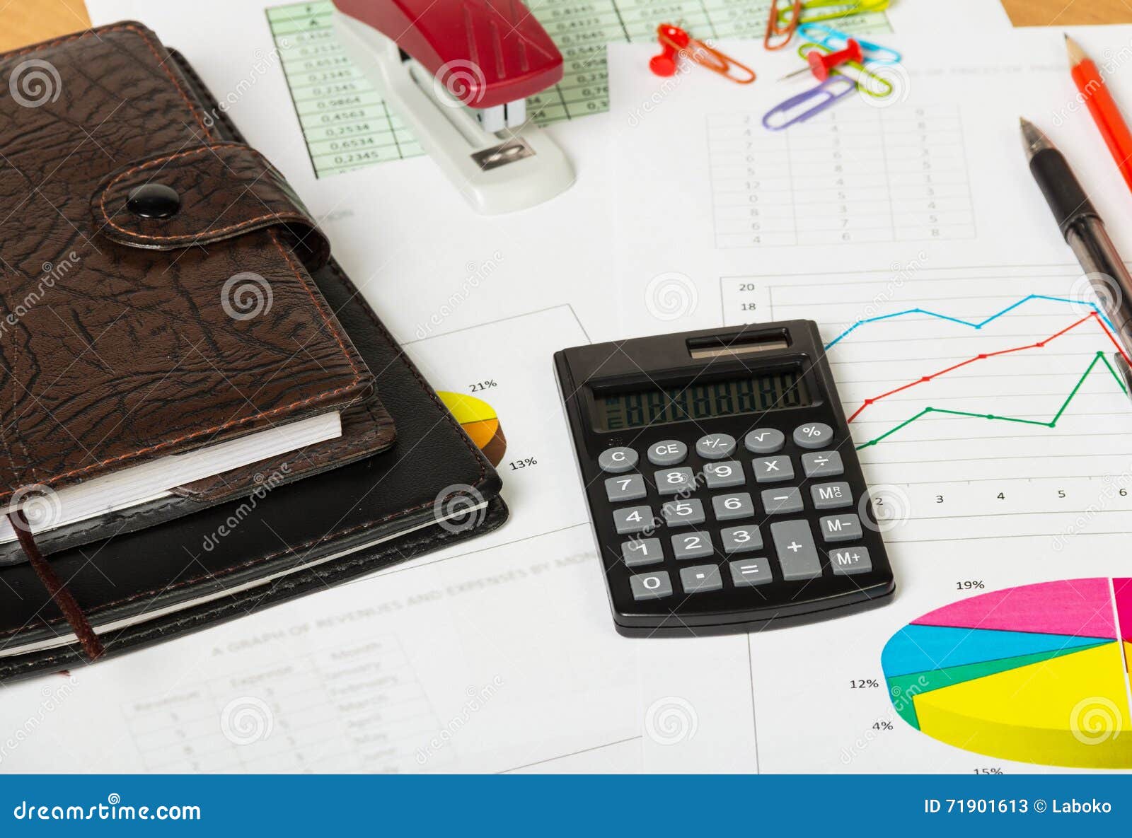 Notebooks, Calculator and Various Stationery Items on Desktop ...