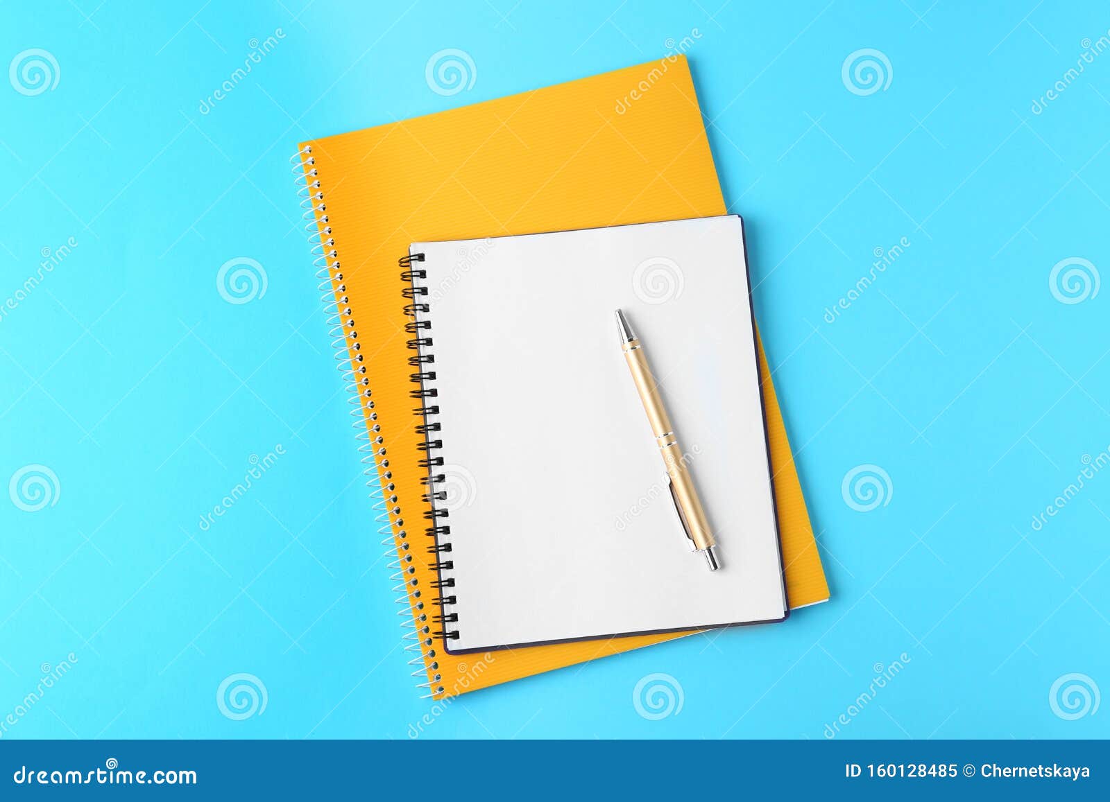 Notebooks and Pen on Light Blue Background Stock Image - Image of ...