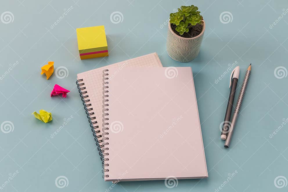 Notebooks, Pen, Stickers on a Blue Background. Conceptual Image Stock ...