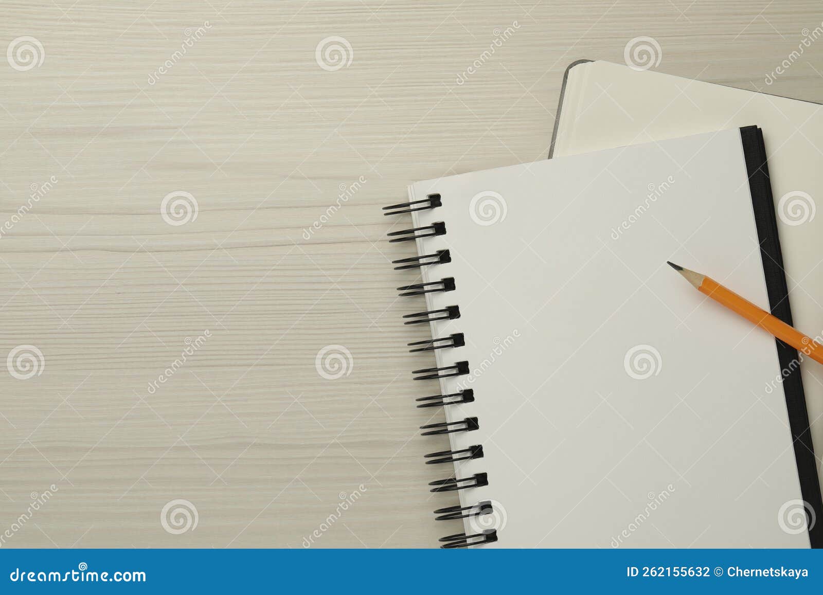 Notebooks and Pencil on White Wooden Table, Top View. Space for Text ...