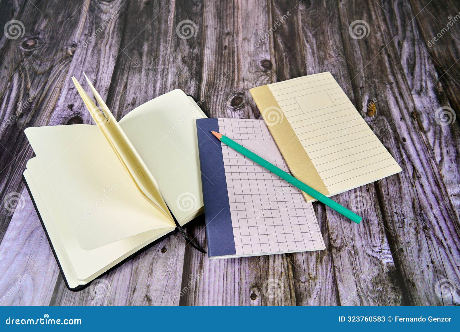 Notebooks and Stationery Placed on Wooden Table in Light Stock Image ...