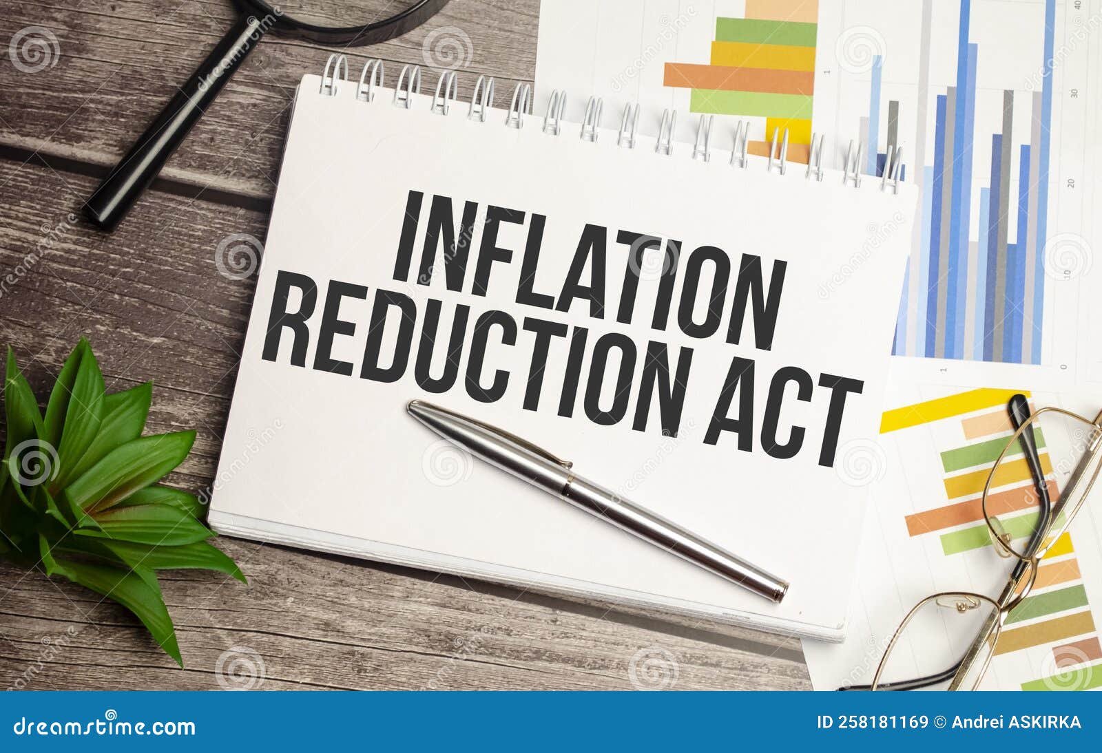 Notepad Chart And Calculator Top View Text Inflation Reduction Act