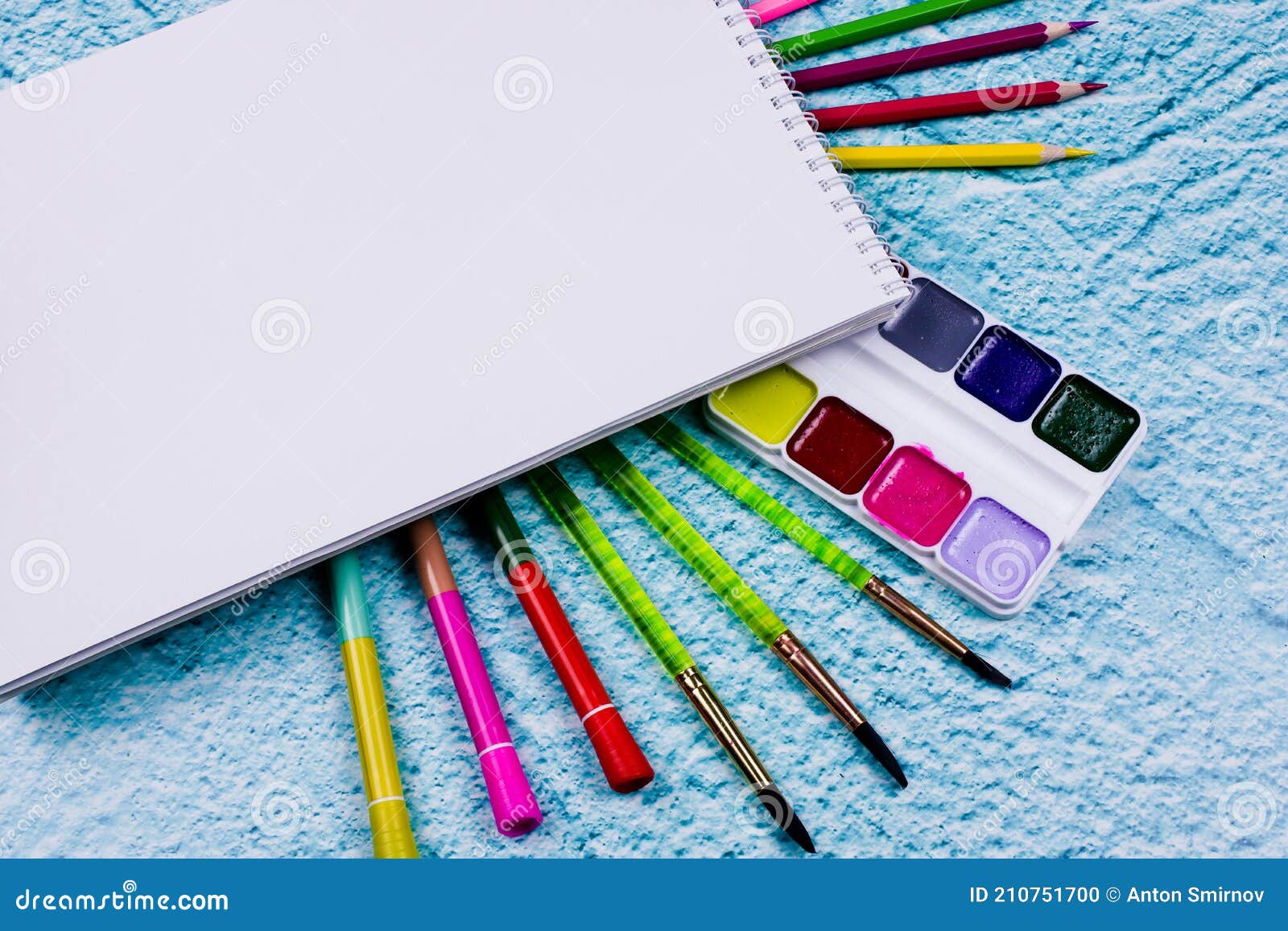 Notepad for Drawing with Paints and Multi-colored Pancils on a Blue ...